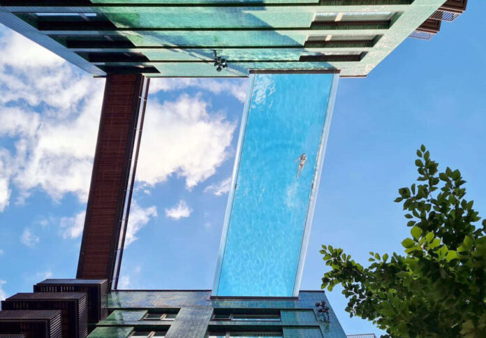 Would you swim in a "floating pool" suspended between two skyscrapers?